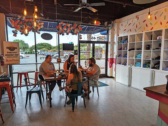 The communal tables foster the kind of breakfast camaraderie that happens when strangers bond over their mutual appreciation for fried dough perfection.