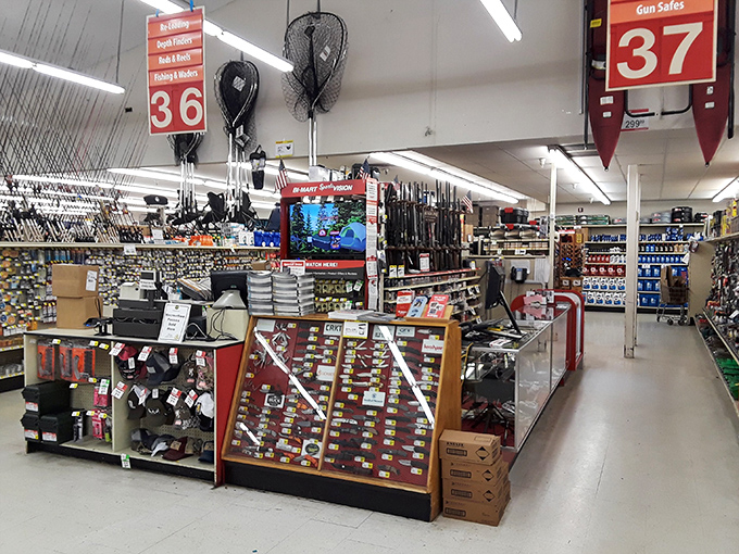 The welcoming Bi-Mart exterior with its signature red signage. A garden center that rivals nurseries sits right outside, tempting you before you even enter. 