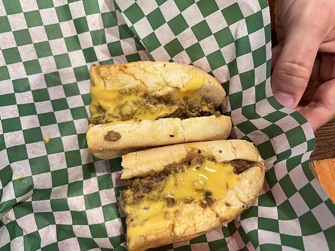 The Cheez Whiz version—controversial to some, religious experience to others—glows with an almost nuclear yellow that whispers, "Worth it."