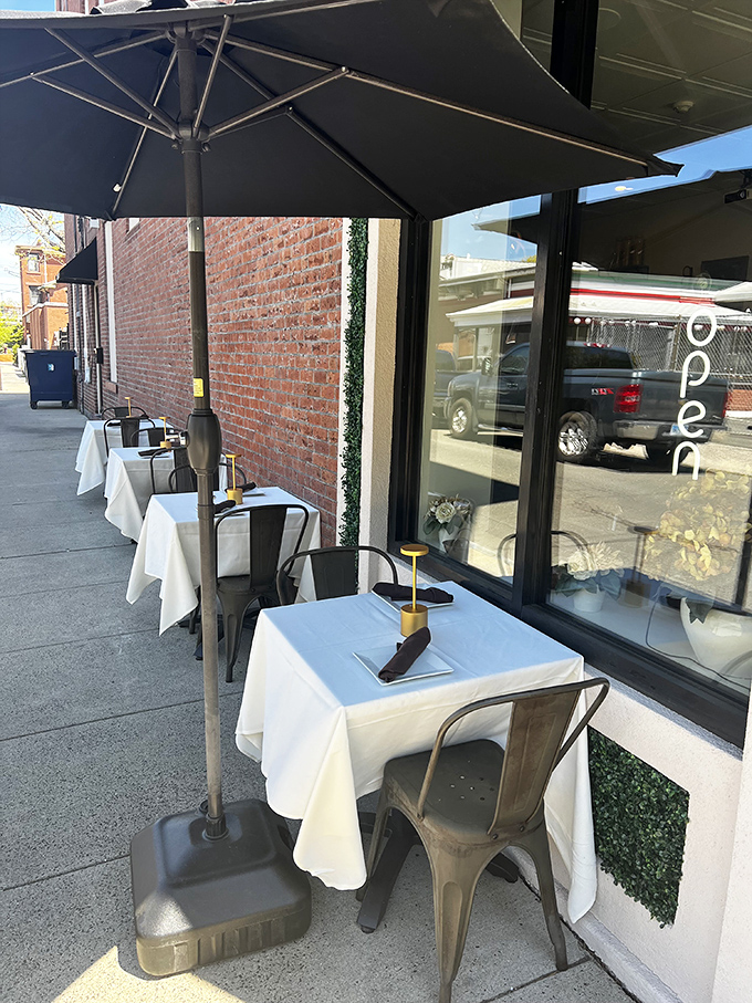 Outdoor dining at Pasta Eataliana isn't just eating outside—it's theater seating for New Haven's charming streetscape, complete with crisp white tablecloths.