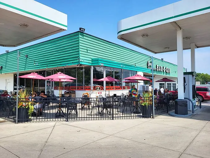 Even the outdoor seating maintains the gas station charm. Where else can you enjoy world-class barbecue while watching someone pump premium unleaded?
