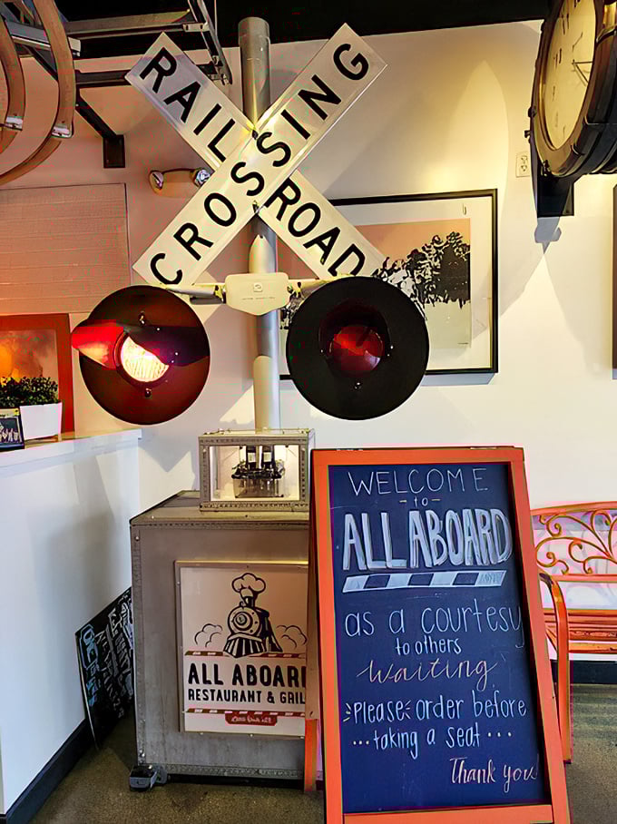 The railroad crossing sign isn't just decoration—it's a warning that you're about to be stopped in your tracks by seriously good food.