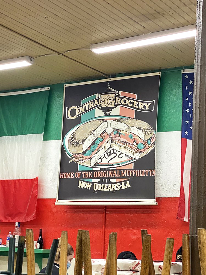 The Italian and American flags flank the sandwich hero poster like it's being inducted into a delicious hall of fame—which, let's be honest, it deserves.