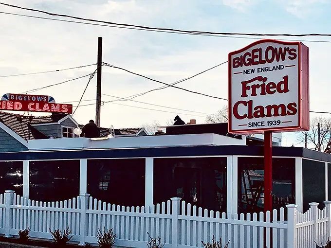Bigelow's iconic red sign promises fried clam nirvana – like a lighthouse guiding hungry sailors to crispy, golden treasure.