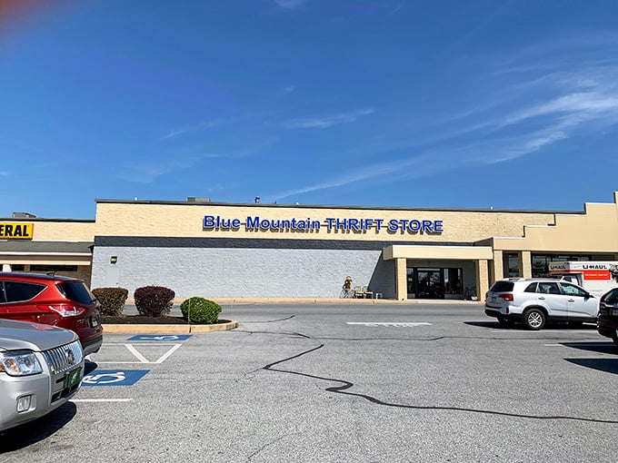 Blue Mountain Thrift Store beckons with its no-frills exterior – like a piñata, the true treasures await inside!