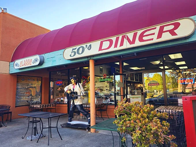 The Classic 50's Diner's cherry-red awning isn't just eye-catching—it's a time portal to when Elvis was king and milkshakes came with the metal mixing cup.