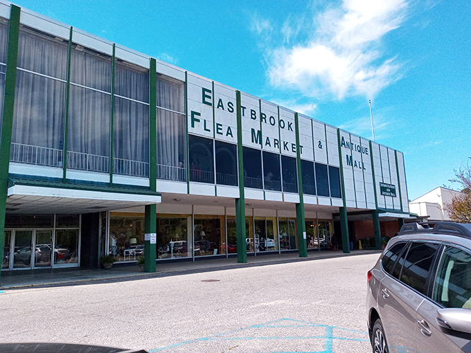 The retro facade of Eastbrook Flea Market stands like a time portal to bargain paradise—architectural proof that treasure hunting never goes out of style.