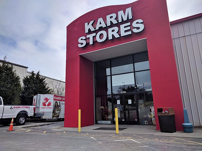 KARM Stores: That bold red entrance isn't just eye-catching—it's like a siren call to bargain hunters everywhere!