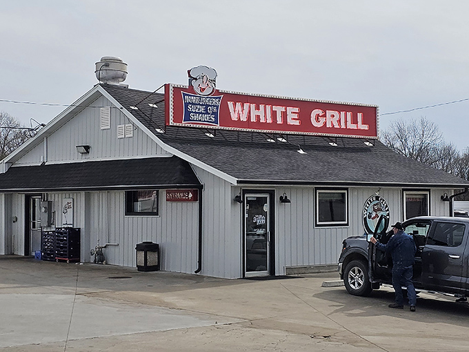 The White Grill's iconic sign promises burgers and shakes – a humble declaration that barely hints at the flavor paradise waiting inside.