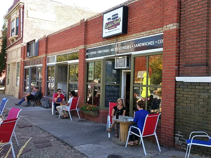 Local sandwich lovers gather outside Curtis Park's brick façade, where yellow chairs invite you to savor your creation in the Colorado sunshine.