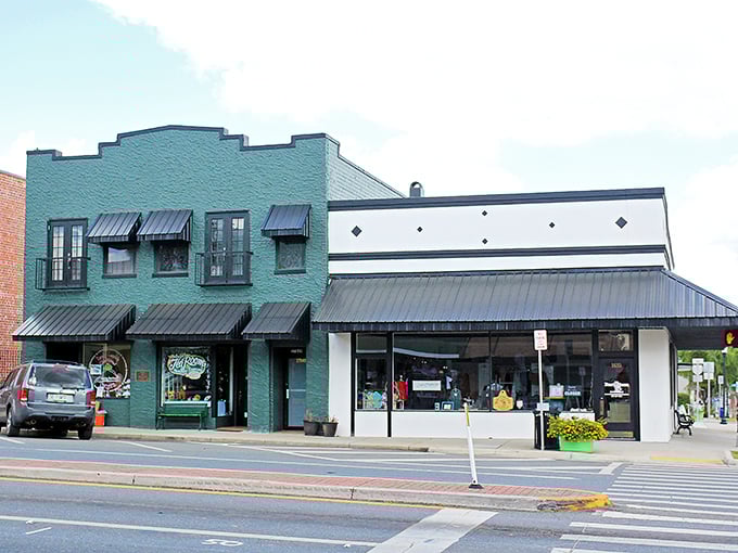 These mint-green awnings aren't just pretty—they're time machines to when downtown shopping didn't require a mall map.