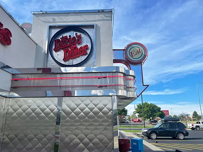 Those vintage diner curves don't lie! Dixie's classic "Eat" sign promises all the comfort food magic of a 1950s roadside dream come true.