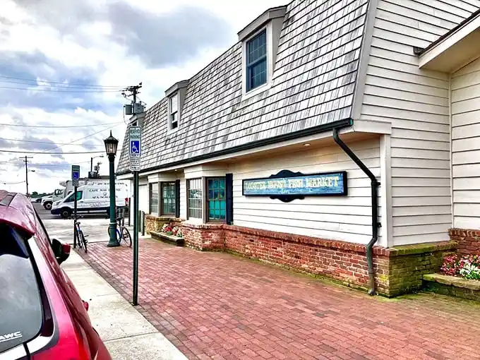 The Lobster House: That classic seaside charm where napkins are necessary and seafood arrives fresh from boats you can actually see.