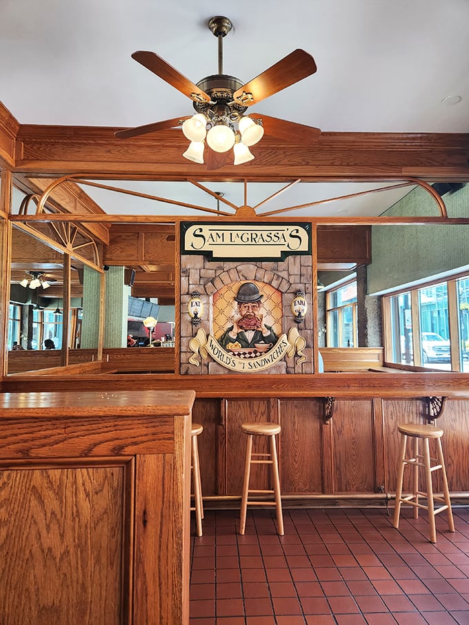 Warm wood tones and that iconic sandwich-man logo welcome you into a temple of deli delights where sandwich dreams come true.