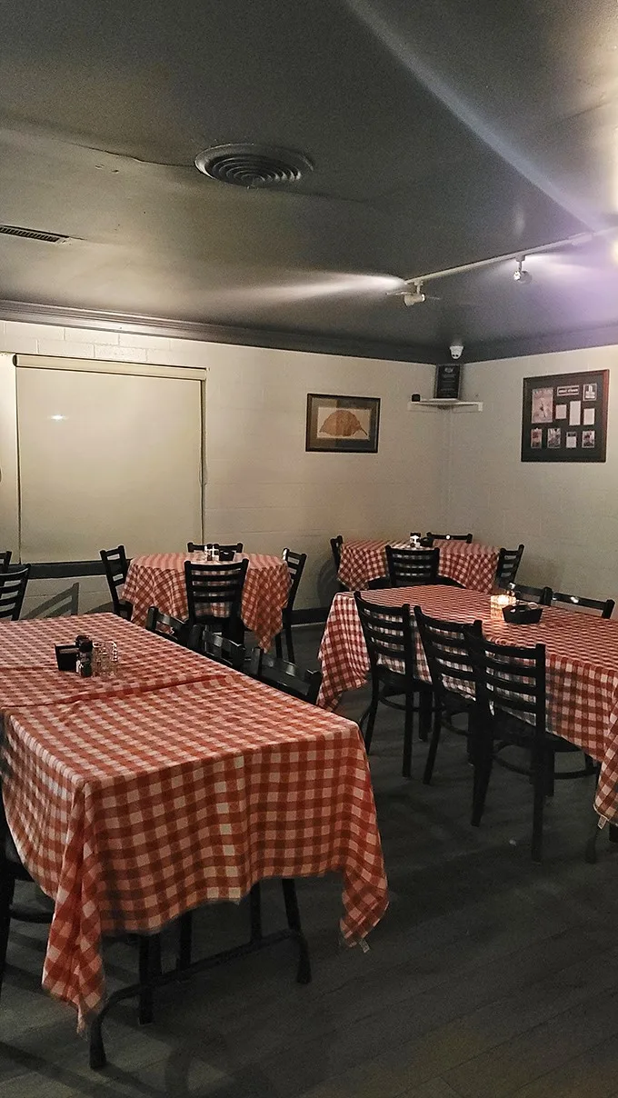Red-and-white checkered tablecloths signal you're in for honest food, not culinary pageantry. No white tablecloths needed for perfection.