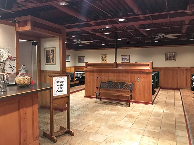 Wood paneling and simple elegance create that "Nonna's dining room" vibe—minus the plastic-covered furniture and cheek pinching.