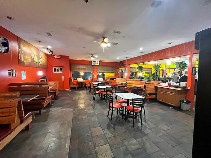 Warm orange walls and wooden booths create the perfect no-frills backdrop for serious sandwich enjoyment. This isn't about ambiance—it's about the food.