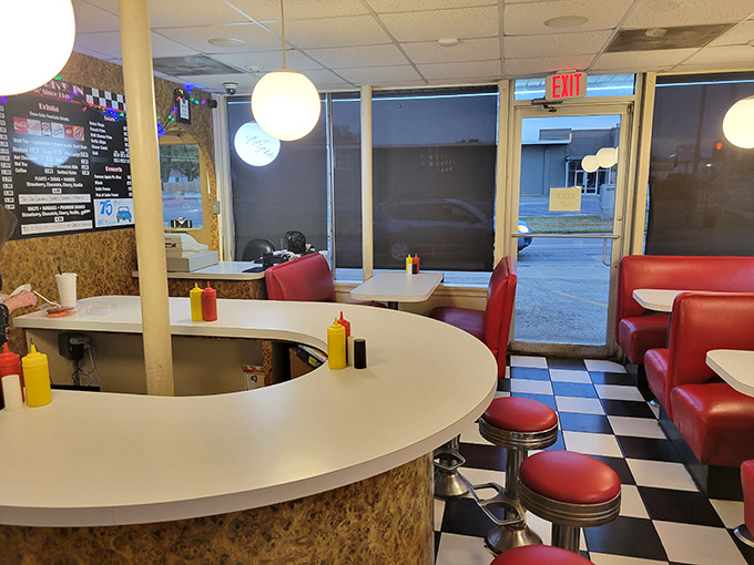 Where time stands deliciously still – the curved counter and cherry-red stools have witnessed decades of first dates, family outings, and regulars seeking burger perfection.