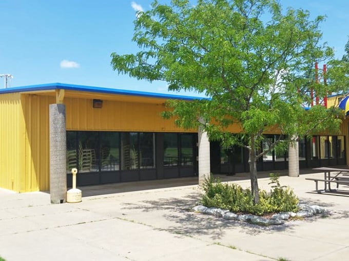 Bright yellow buildings against Kansas blue skies – like a beacon calling to your inner speed demon.
