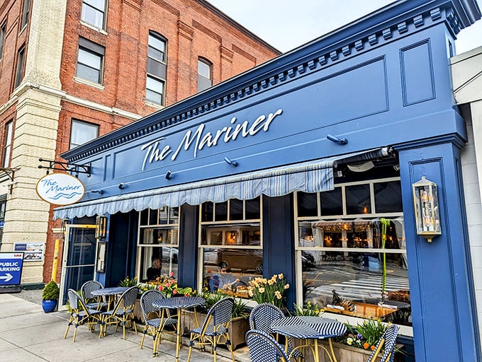 The Mariner's vibrant blue façade stands out like a maritime flag, beckoning hungry sailors and landlubbers alike to dock for a memorable meal.