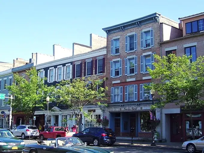 Historic charm meets culinary excellence along Jordan Street, where 19th-century buildings house restaurants that elevate comfort food to art form status.