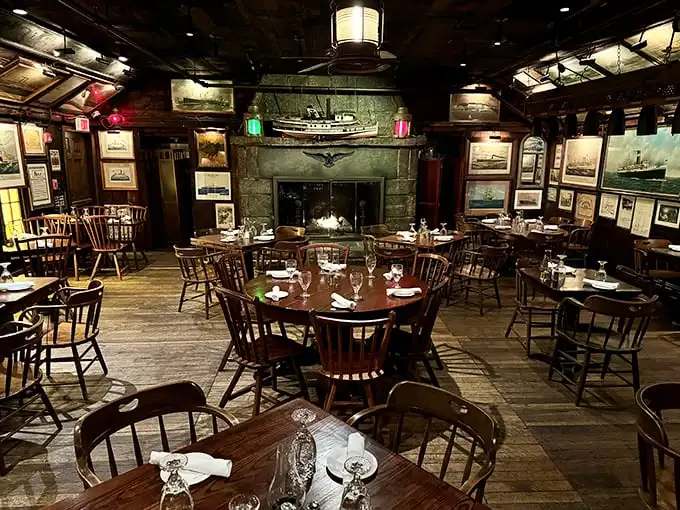 Time travel isn't science fiction at The Gris—it's dinner service. Ship models hang from ancient beams while maritime paintings watch over diners enjoying centuries of tradition.