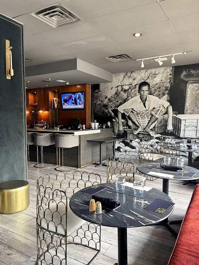 Step inside and the transformation is complete—stylish dining space with historical photography that whispers, "We take our seafood seriously around here."