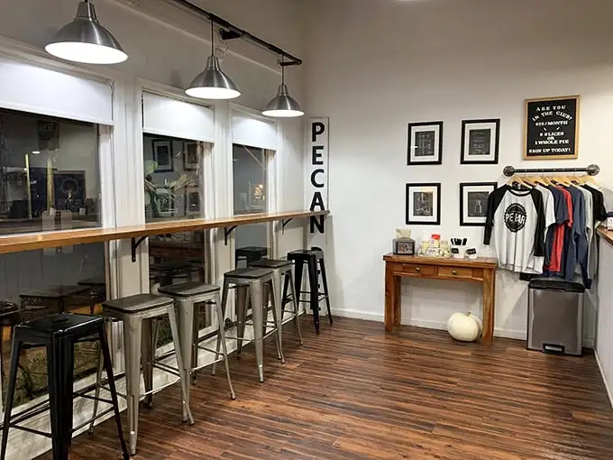 Industrial meets homey in this thoughtfully designed interior. The "PECAN" sign isn't just decoration—it's a sacred directional marker to bliss.