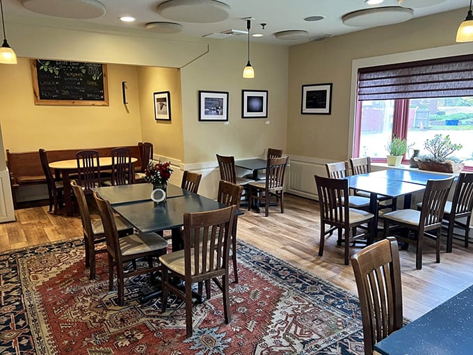 Area rugs, warm lighting, and thoughtfully arranged wooden tables create the perfect New England atmosphere—casual enough for Tuesday dinner, refined enough for Saturday date night.