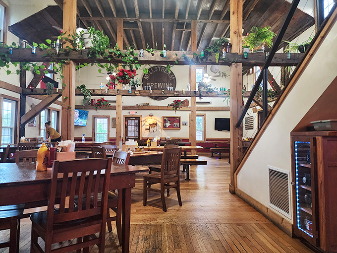 Exposed wooden beams and hanging greenery create a space that feels both rustic and inviting—like your German grandmother's living room, if she had excellent taste in architecture.