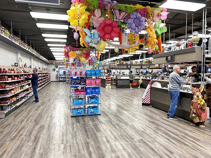 Spacious aisles beckon with endless possibilities, where colorful displays and hanging decorations create a carnival for your sweet tooth.