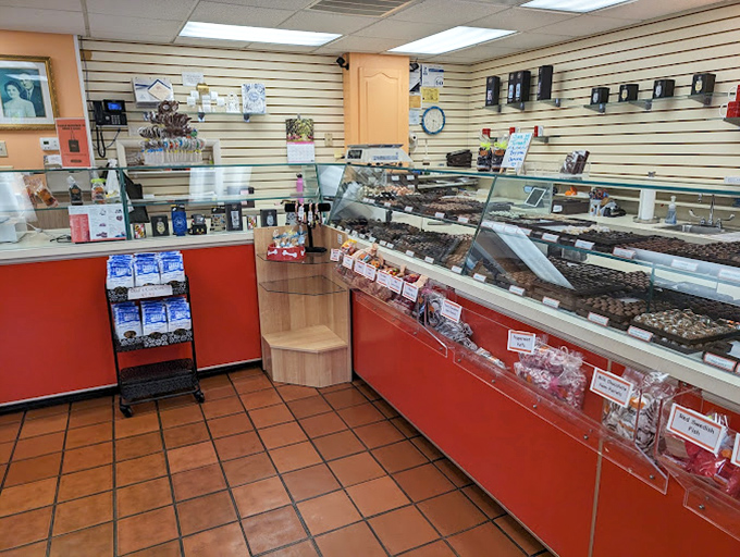 Inside Rheb's, time stands still. The classic display cases and red counters create a candy wonderland that feels delightfully unchanged by modern trends.