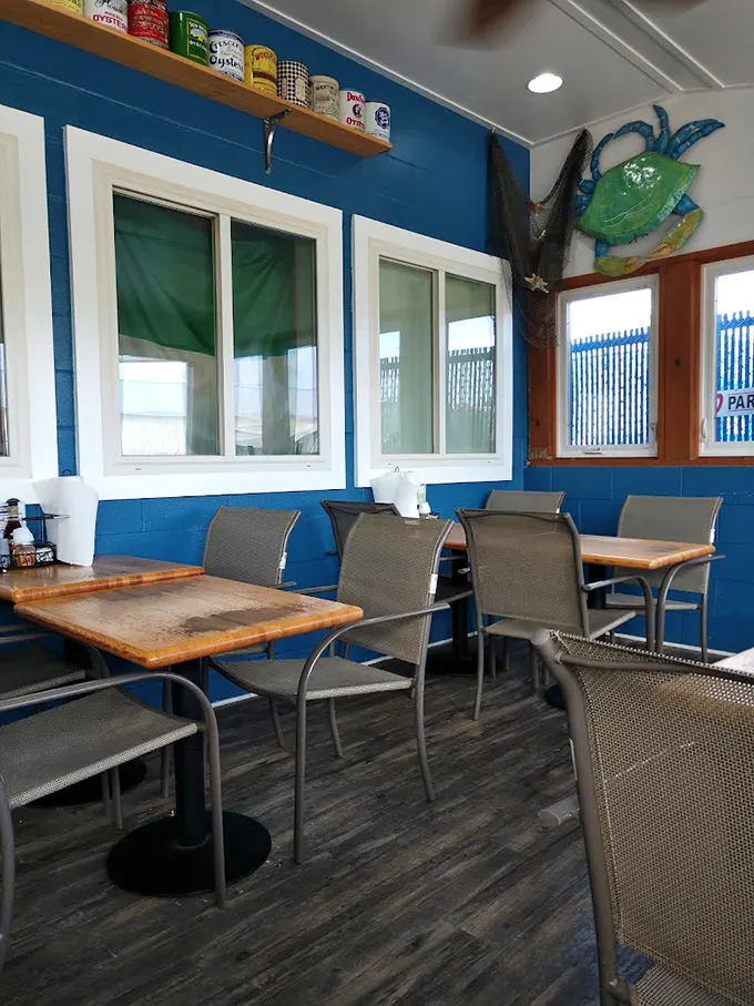 Simple blue walls adorned with fishing nets and crab decor tell you everything you need to know: this place prioritizes seafood over swank.