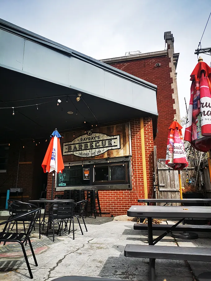 Brick walls and wooden signage create the perfect backdrop for barbecue bliss. This isn't just dining—it's a meat meditation space.