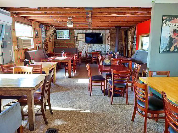 No white tablecloths here, just honest wooden tables where barbecue dreams come true. The rustic interior feels like your favorite uncle's cabin—if your uncle was a smoke whisperer.