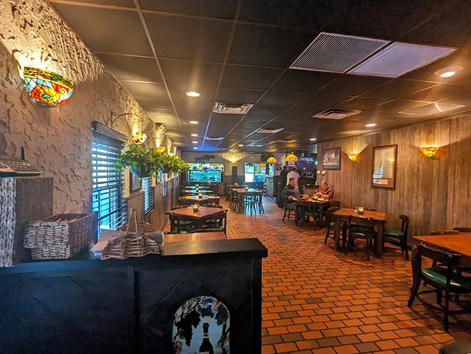 Step inside and time slows down – wood paneling, terra cotta floors, and stained glass fixtures create the kind of atmosphere where memories are made over meals.