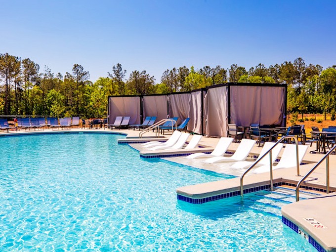 Sunshine, crystal-clear water, and zero chance of rain – the outdoor pool area offers a perfect respite from indoor water adventures.