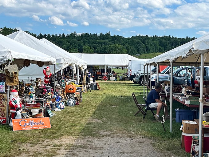 White tents stretch to the horizon at Brimfield, America's antique Disneyland where the thrill of the hunt keeps you going.