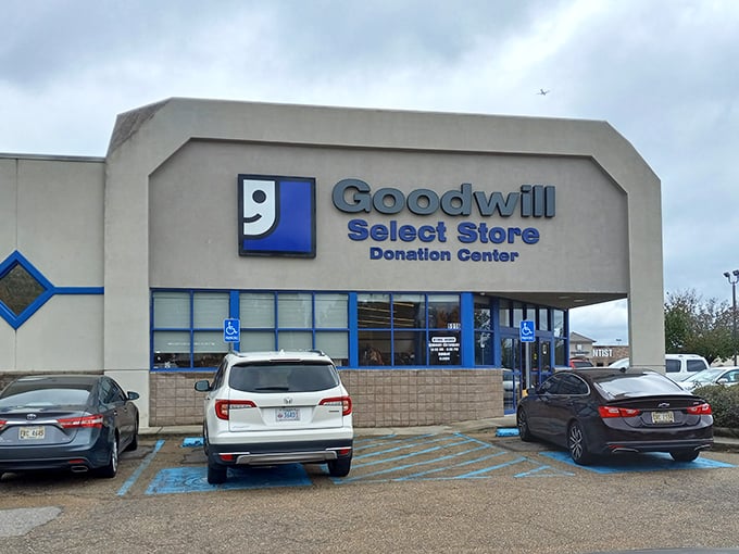 Goodwill: "Come shop today! That sidewalk sign might as well say 'Abandon budget, all ye who enter 