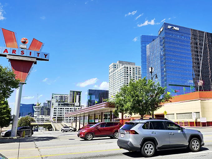 Downtown Atlanta's skyline frames The Varsity perfectly—where generations have savored chili dogs and Frosted Oranges while watching the city grow around them.
