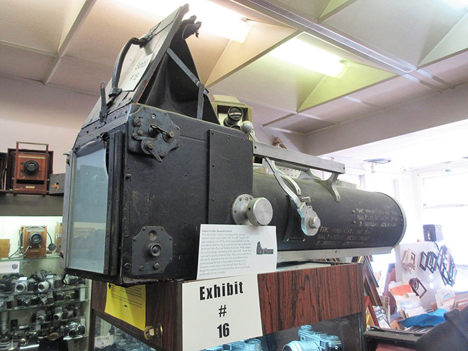 This behemoth camera looks like it could photograph a dinosaur—or at least require one to carry it. Early photographers needed serious upper body strength!