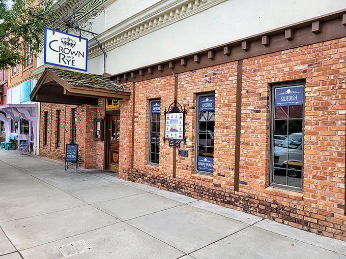 The Crown & Rye's warm brick facade isn't just inviting—it's practically sending you a handwritten dinner invitation.
