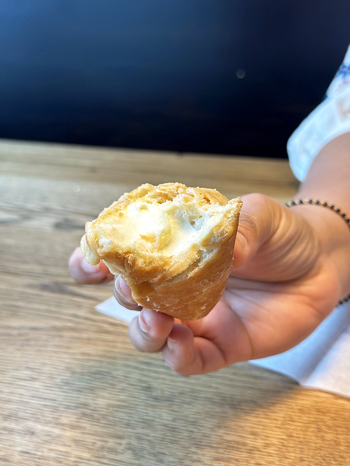 This cream-filled pastry isn't just a donut—it's edible evidence that simplicity and perfection often go hand in hand. Worth every delicious calorie!