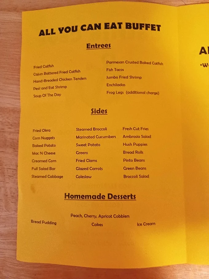 The bright yellow menu reads like a coastal dream sequence. In Oklahoma terms, this is the seafood equivalent of striking oil.