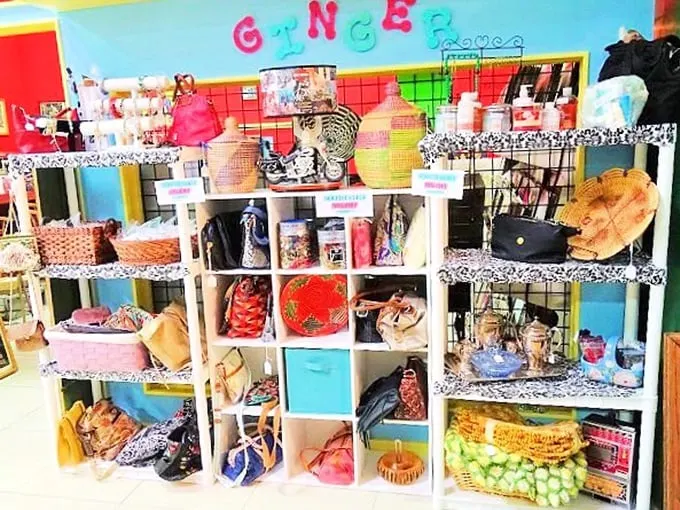A kaleidoscope of vintage handbags and colorful treasures. This booth looks like your stylish grandmother's closet exploded in the most magnificent way.