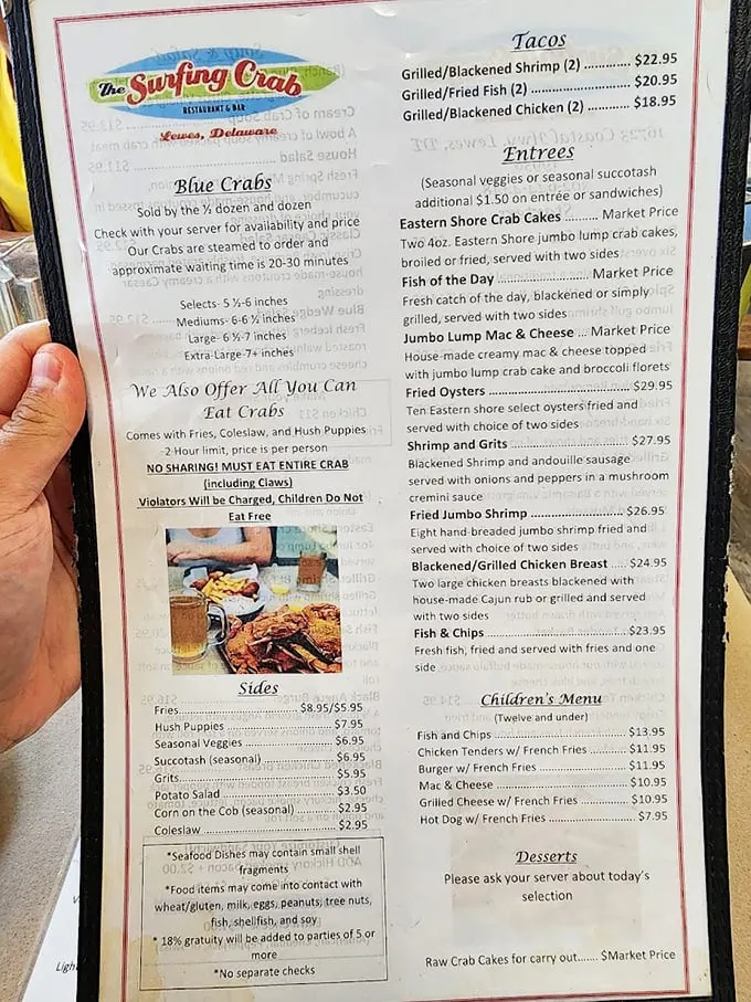 This menu isn't just a list of options—it's a treasure map. Note the stern warning about the all-you-can-eat crabs: they're serious about their seafood.