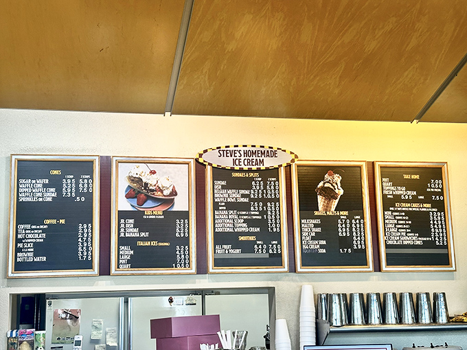The menu board reads like poetry for dessert lovers—dozens of homemade flavors that make choosing just one scoop the day's most delightful dilemma.