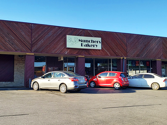 Munchers Bakery's rustic wooden exterior is the Clark Kent disguise for this superhero of sweetness. Those cars know what's up!