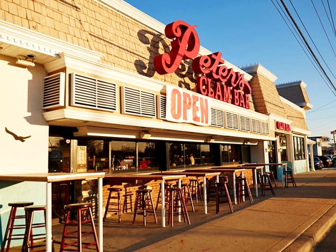 Johnny's blue-and-white facade gleams under perfect skies – the kind of place where calories don't count and seafood dreams come true.