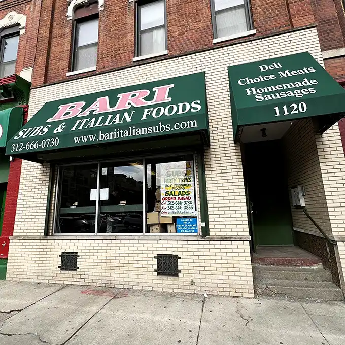The humble brick façade of Bari Foods hides a temple of Italian sandwich mastery. Don't let the simple exterior fool you—magic happens inside.